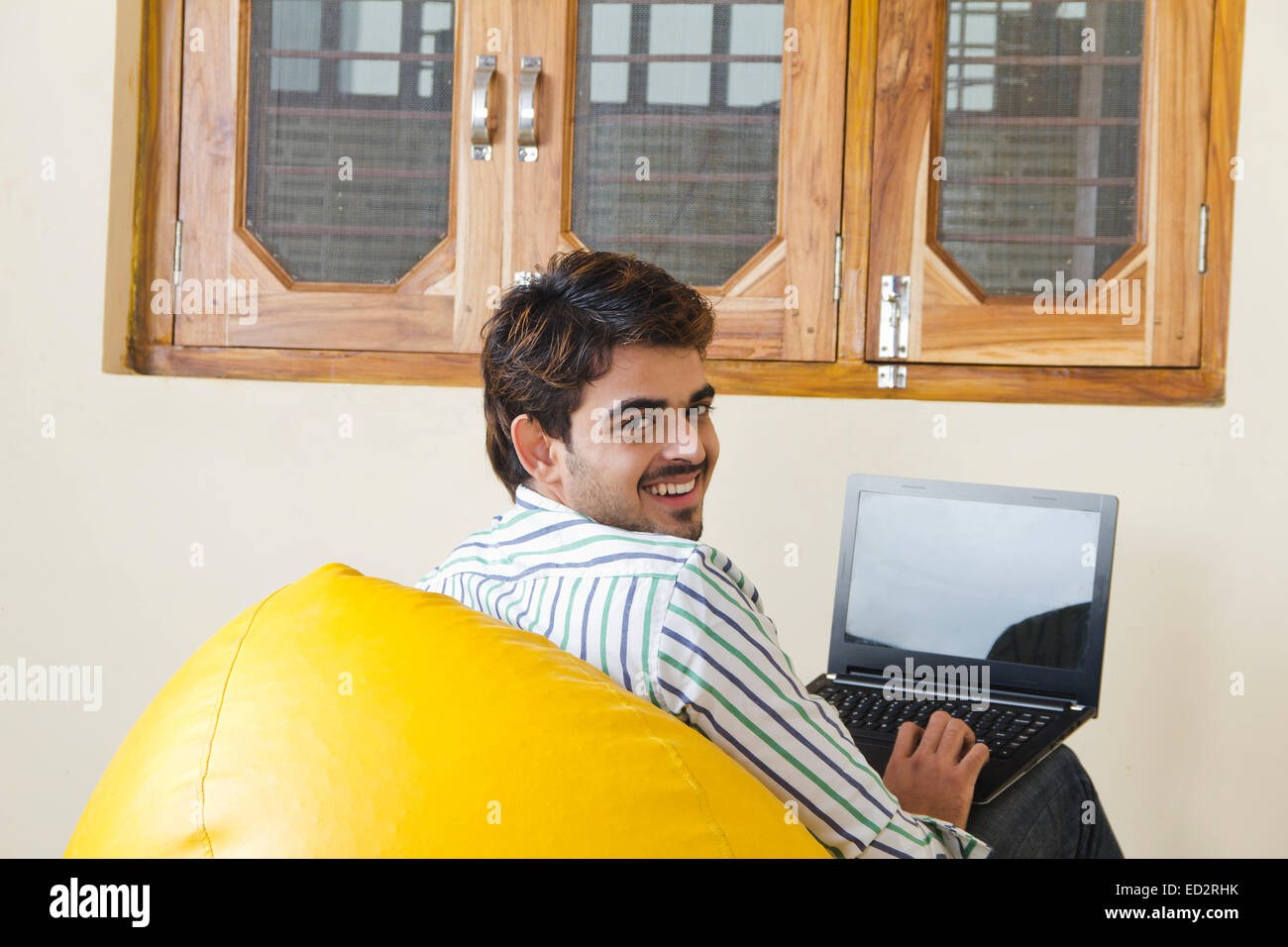 1 indian man home laptop working Stock Photo - Alamy