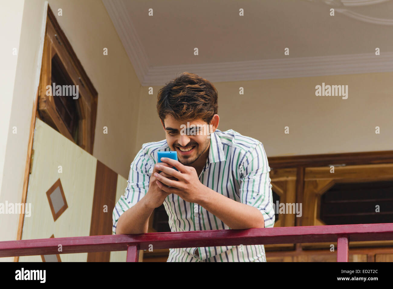Indian man balcony side hi-res stock photography and images - Alamy