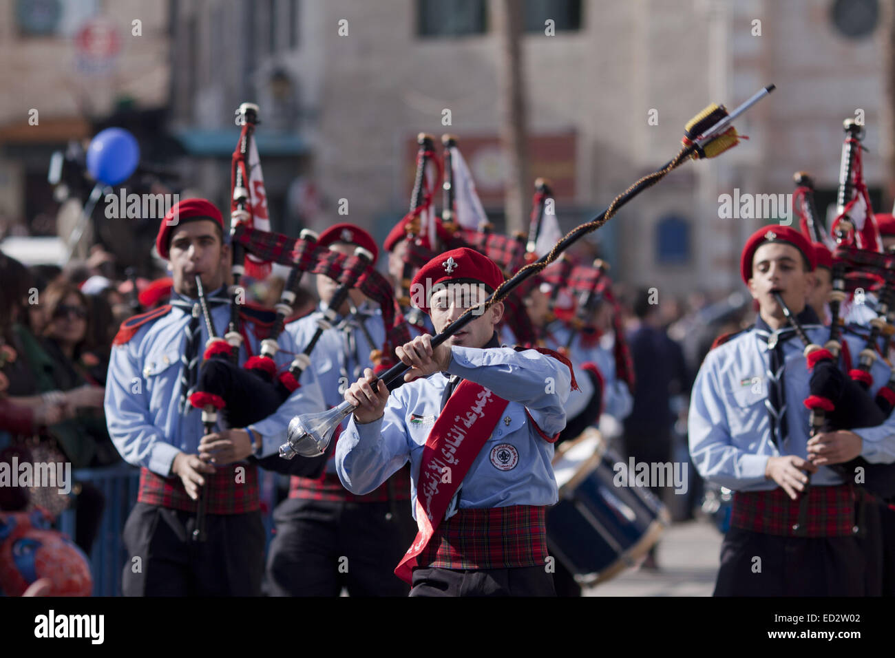 Bethlehem, West Bank. 24th Dec, 2014. Palestinian scouts march in front ...