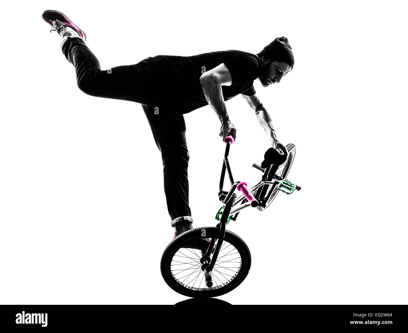 one man exercising bmx acrobatic figure in silhouette studio isolated ...