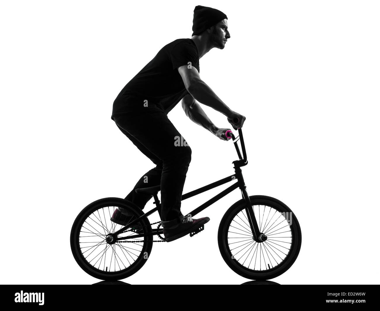 one man exercising bmx acrobatic figure in silhouette studio isolated ...