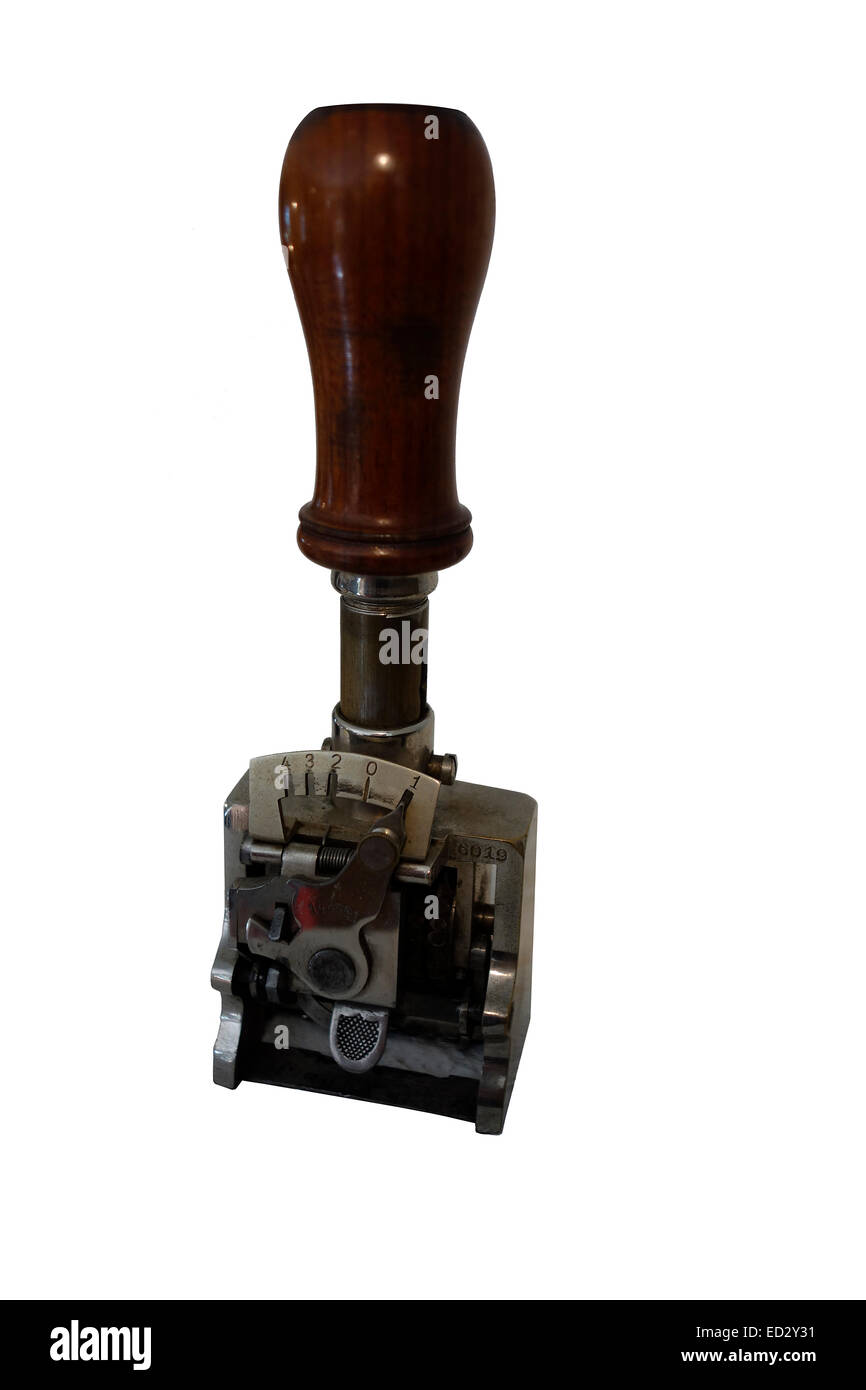 Vintage adjustable rubber stamp with wooden handle Stock Photo - Alamy