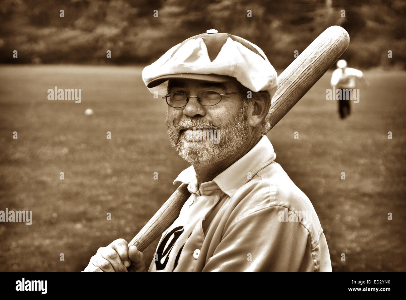 Vintage Base Ball player posing with a bat during a 1850s base ball ...