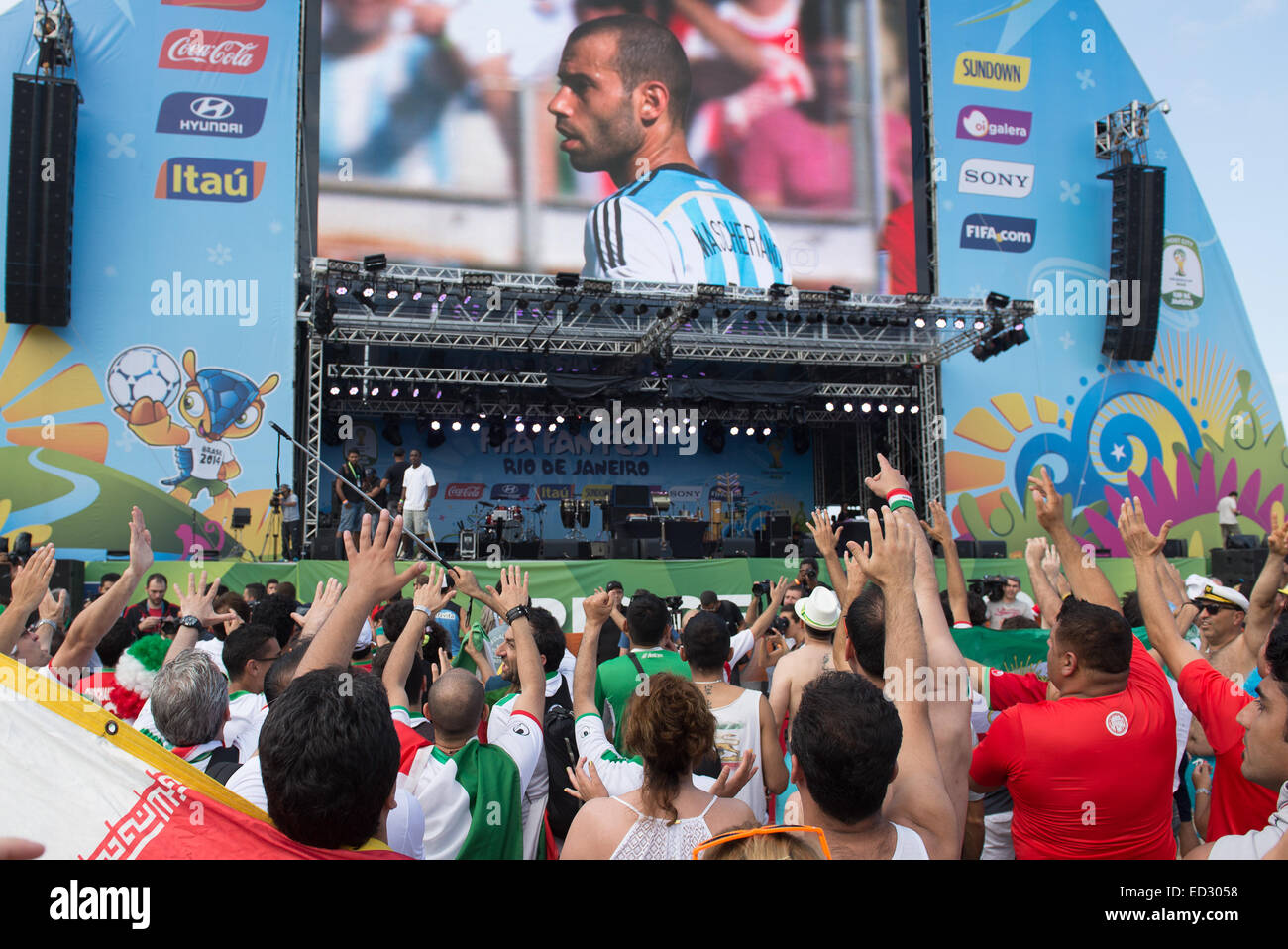 Fans at FIFA Fan Fest Rio de Janeiro watch the televised Group F match ...