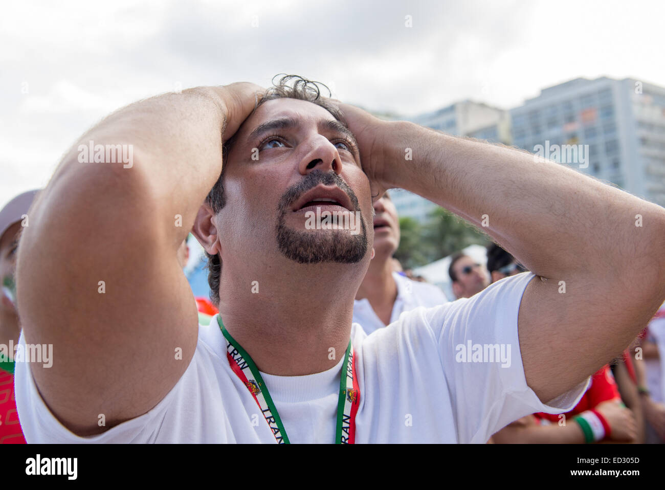 Fans at FIFA Fan Fest Rio de Janeiro watch the televised Group F match ...