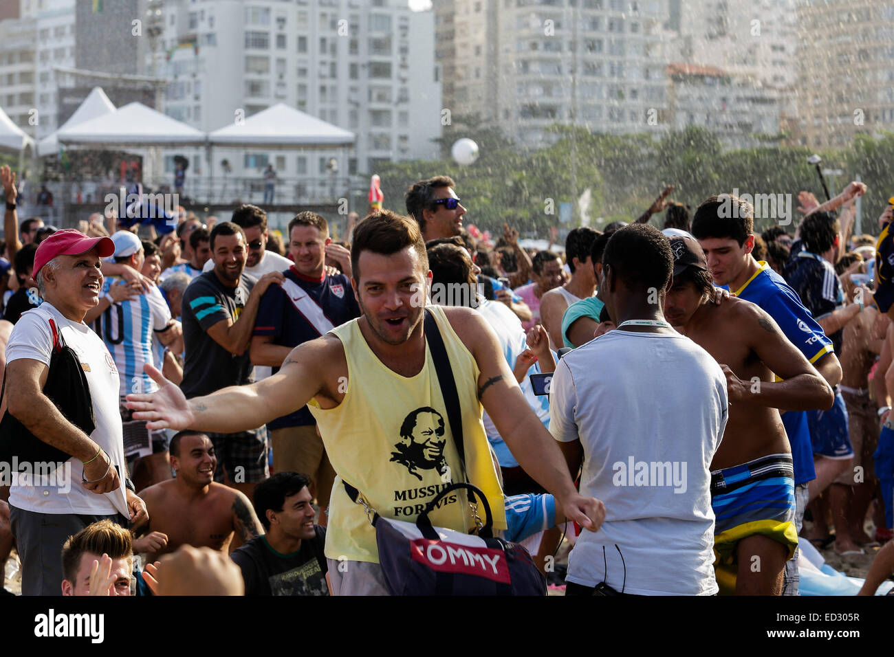 Fans at FIFA Fan Fest Rio de Janeiro watch the televised Group F match ...