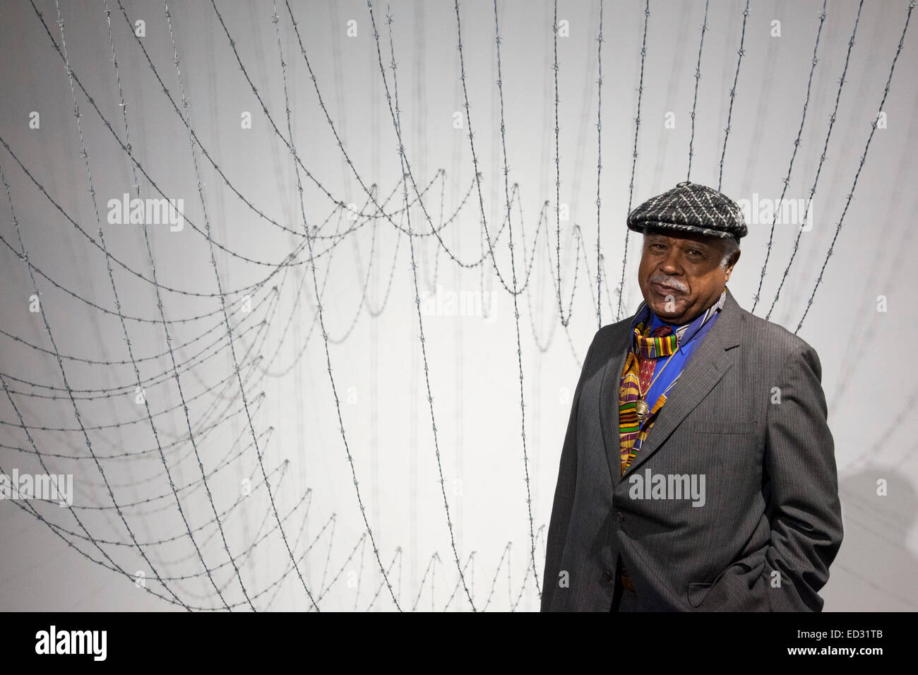 London, UK. 24 November 2014. Artist Melvin Edwards poses with his ...