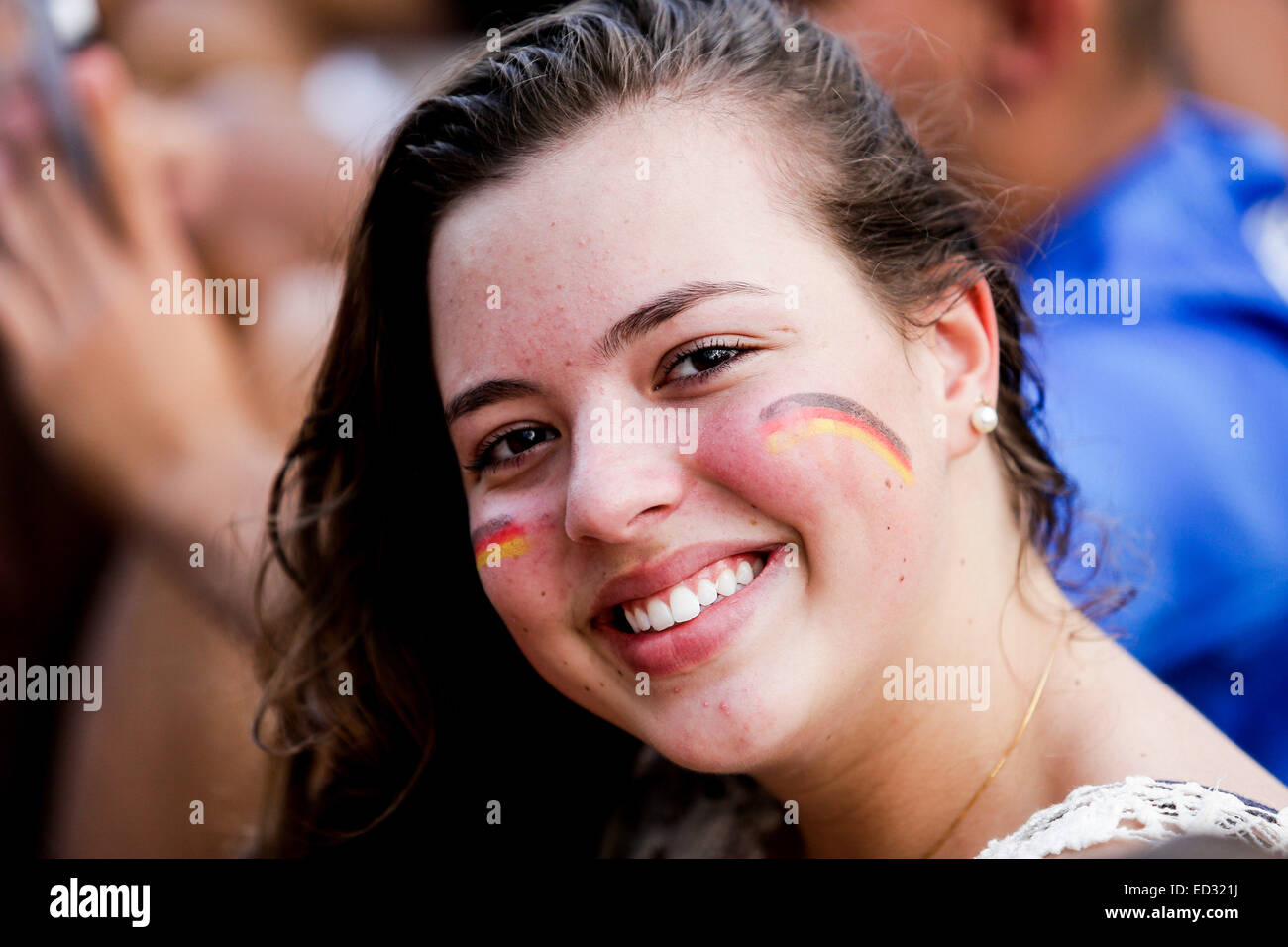 Fans at FIFA Fan Fest Rio de Janeiro watch the televised Group G match ...