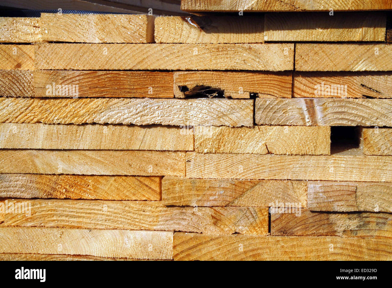 Timber in a pile on the landing Stock Photo - Alamy