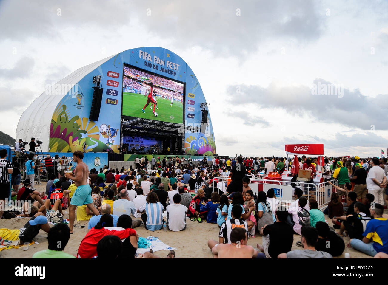 Fans at FIFA Fan Fest Rio de Janeiro watch the televised Group G match ...