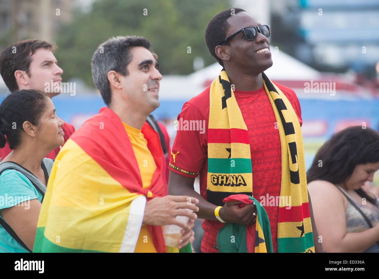 Fans at FIFA Fan Fest Rio de Janeiro watch the televised Group G match ...