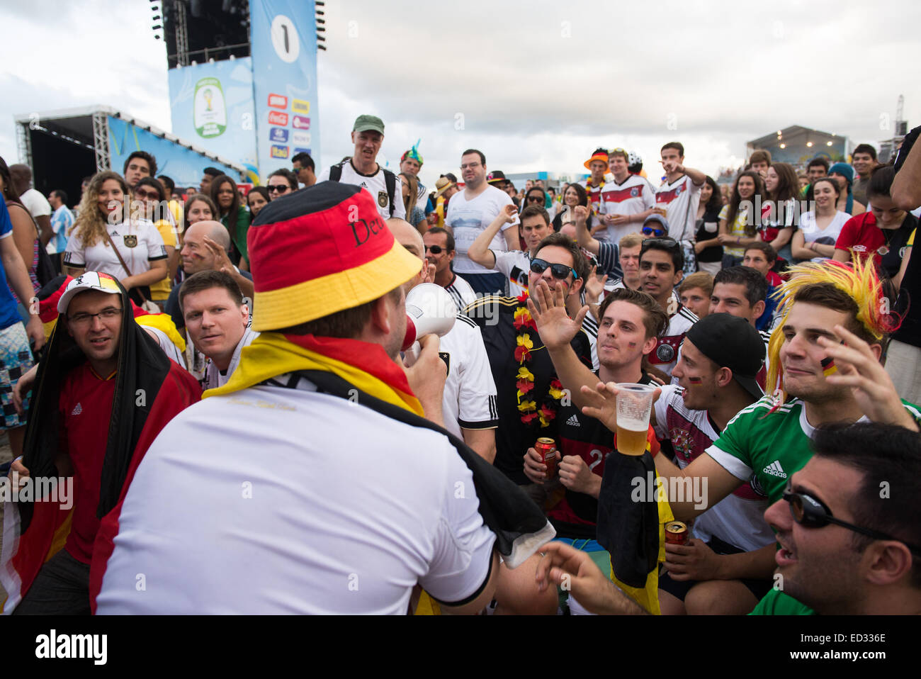 Fans at FIFA Fan Fest Rio de Janeiro watch the televised Group G match ...