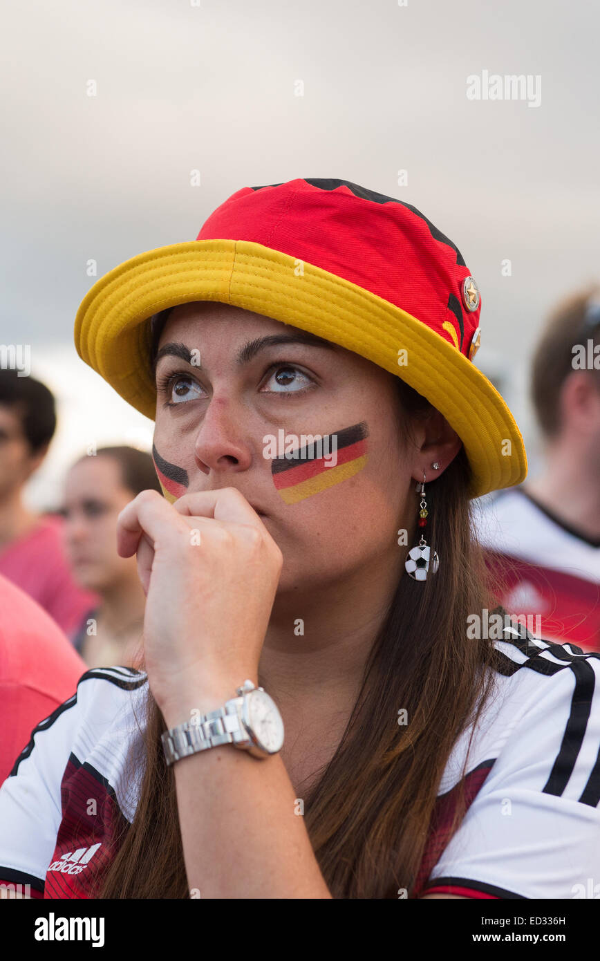Fans at FIFA Fan Fest Rio de Janeiro watch the televised Group G match ...