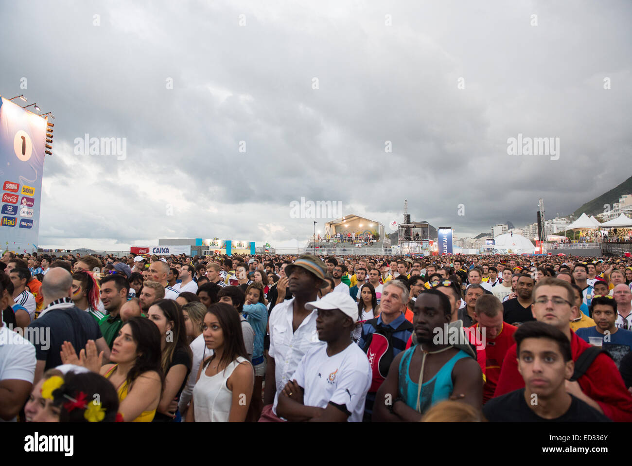 Fans at FIFA Fan Fest Rio de Janeiro watch the televised Group G match ...