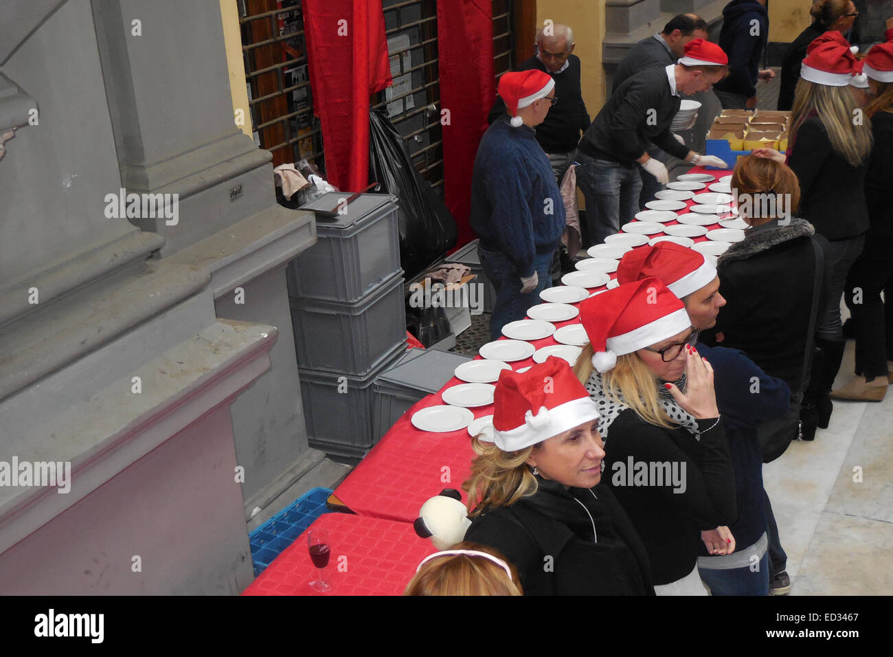Naples, Italy. 24th Dec, 2014. Two hundred volunteers have served about ...