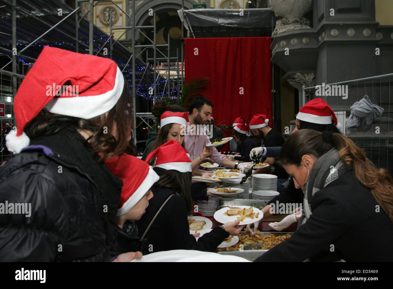 Naples, Italy. 24th Dec, 2014. Two hundred volunteers have served about ...