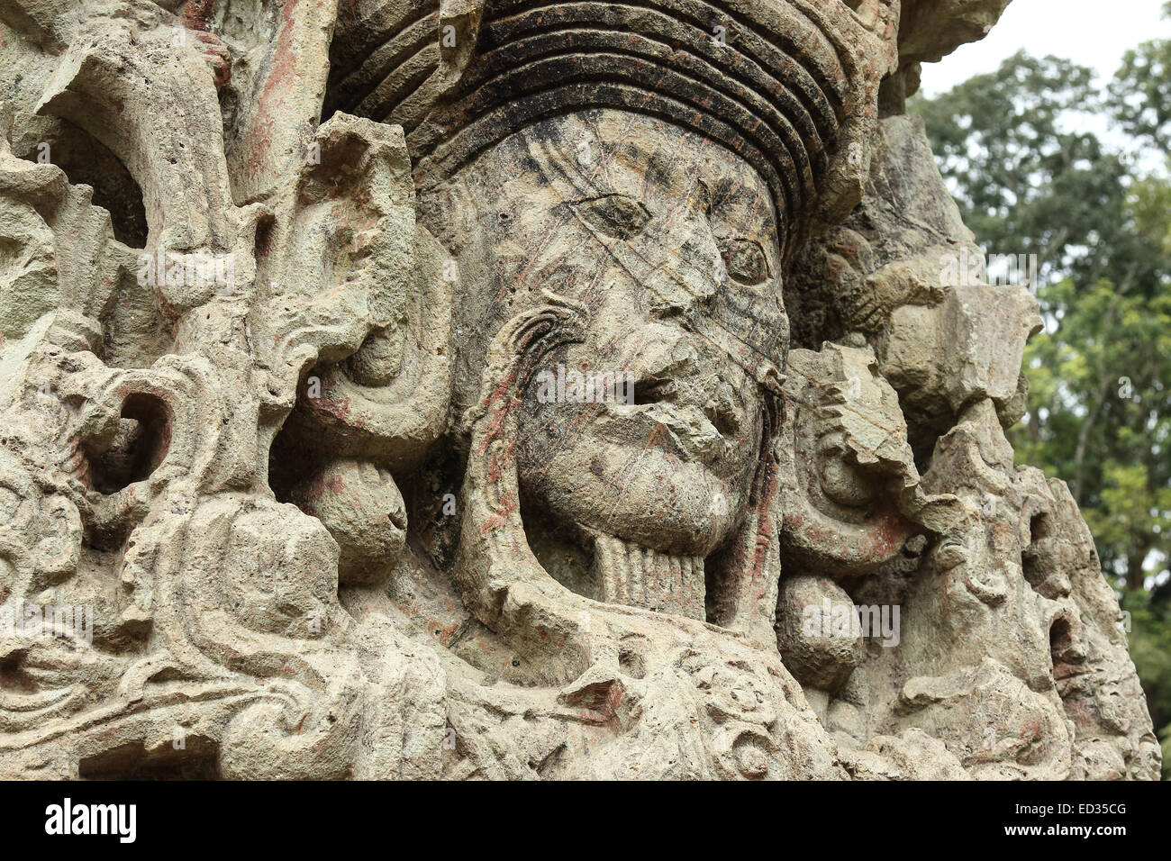 Carved stone stella of the king in Copan, a Mayan archaeological site ...