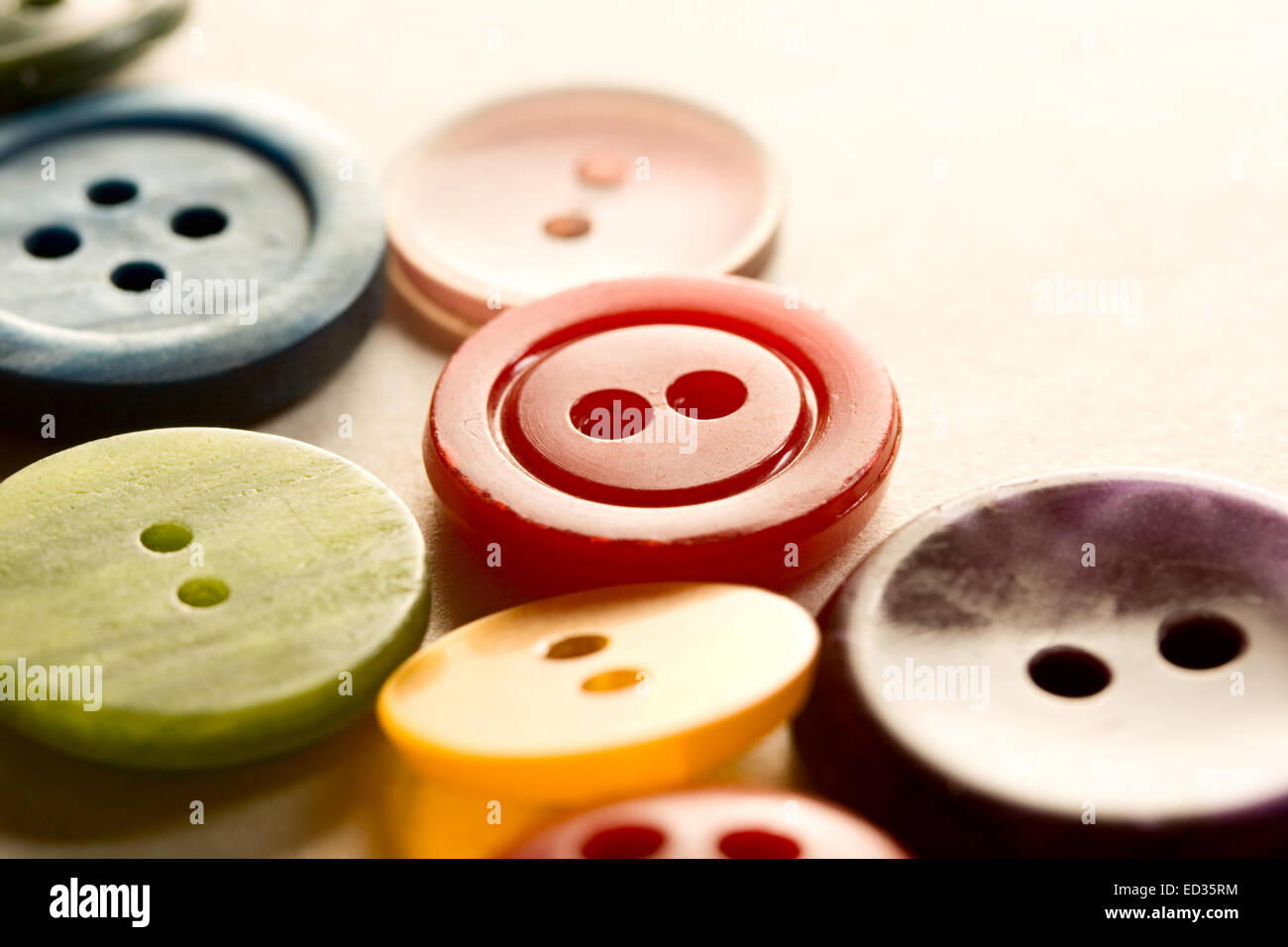 A pile of many-coloured buttons Stock Photo - Alamy
