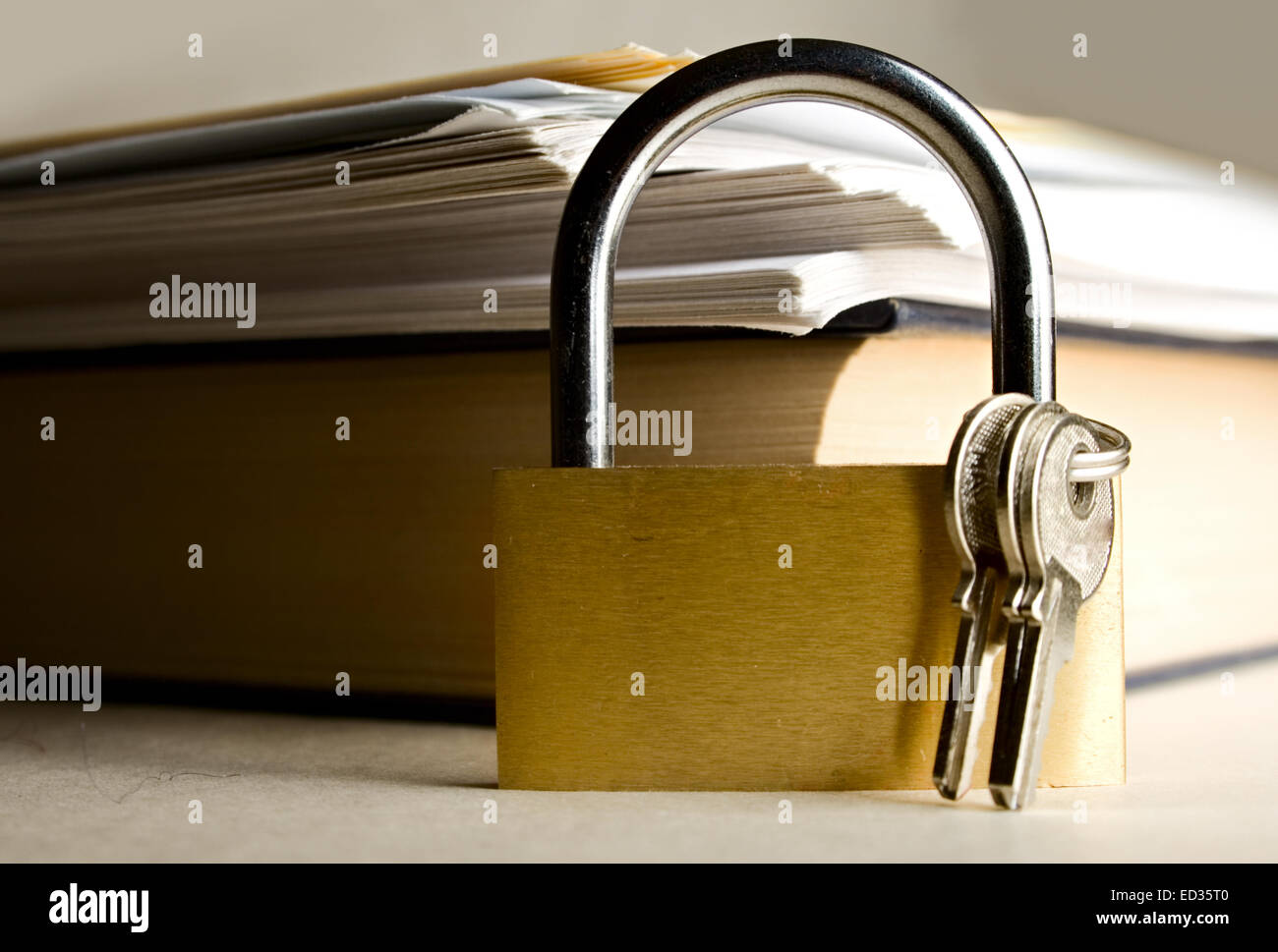 Key lock against the background of paper Stock Photo - Alamy