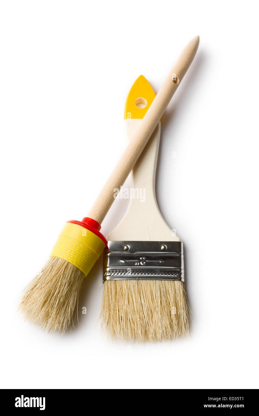 Paintbrushes on wooden background Cut Out Stock Images & Pictures - Alamy