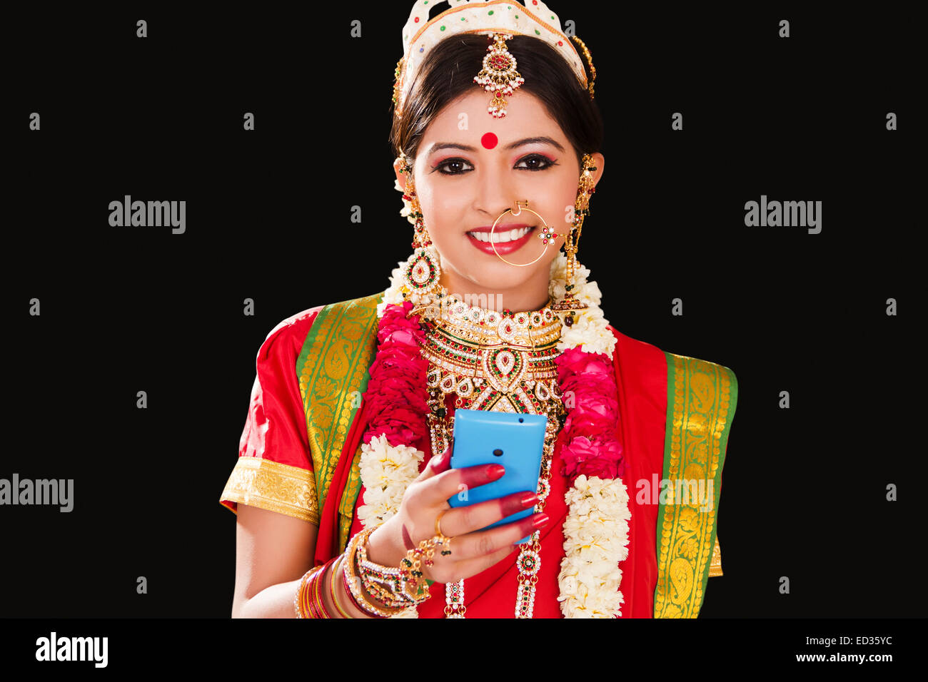 Indian bride mobile phone wedding hi-res stock photography and images ...