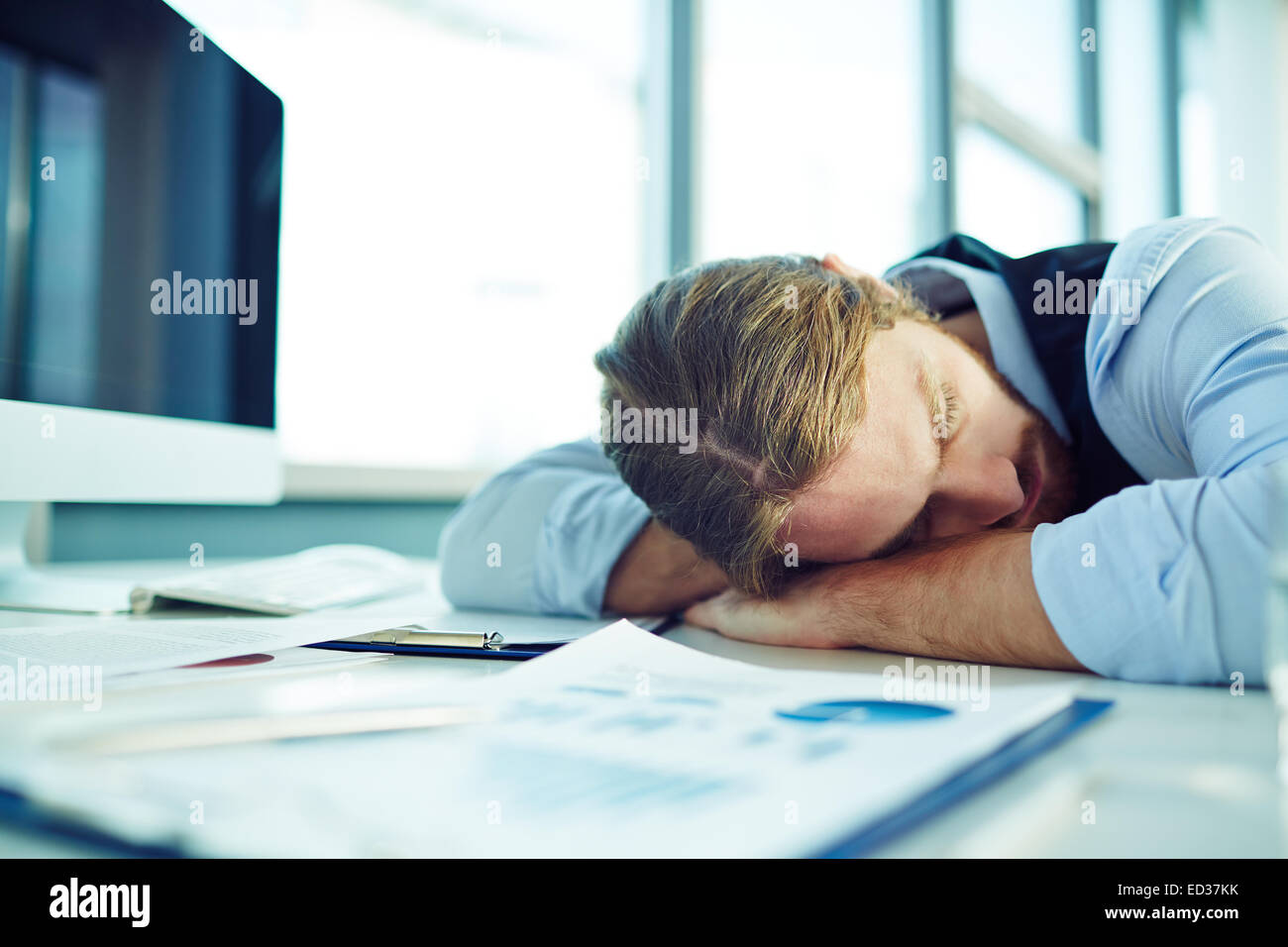 Young tired businessman sleeping hi-res stock photography and images ...