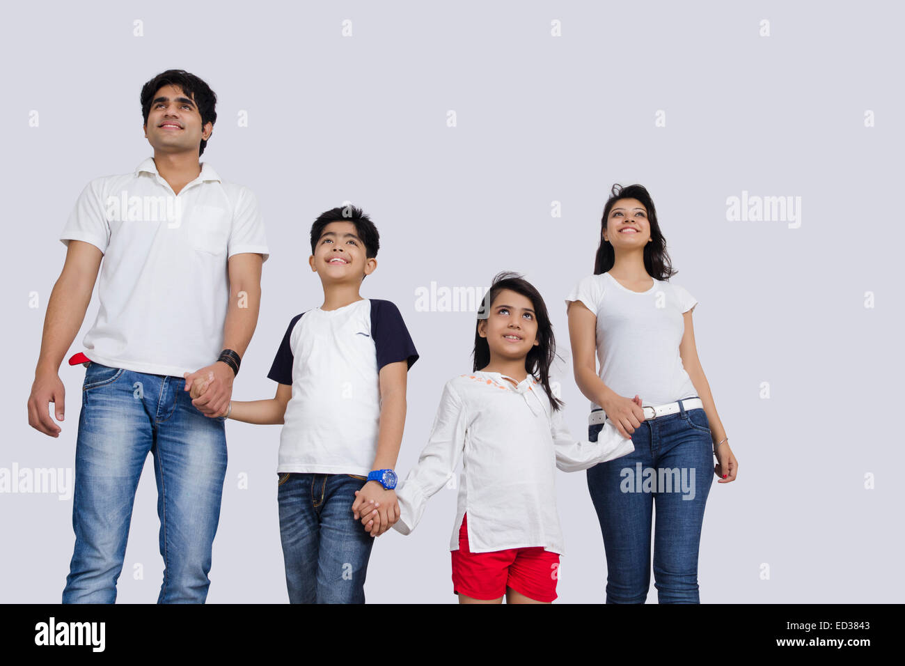 indian Parents and son standing pose Stock Photo - Alamy