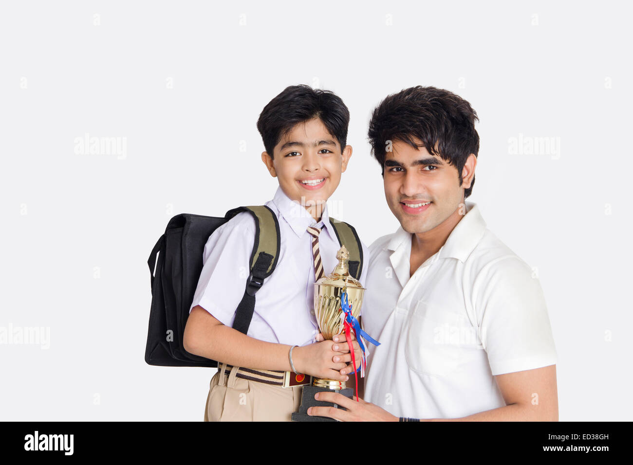 indian father and son Victory Trophy Stock Photo - Alamy