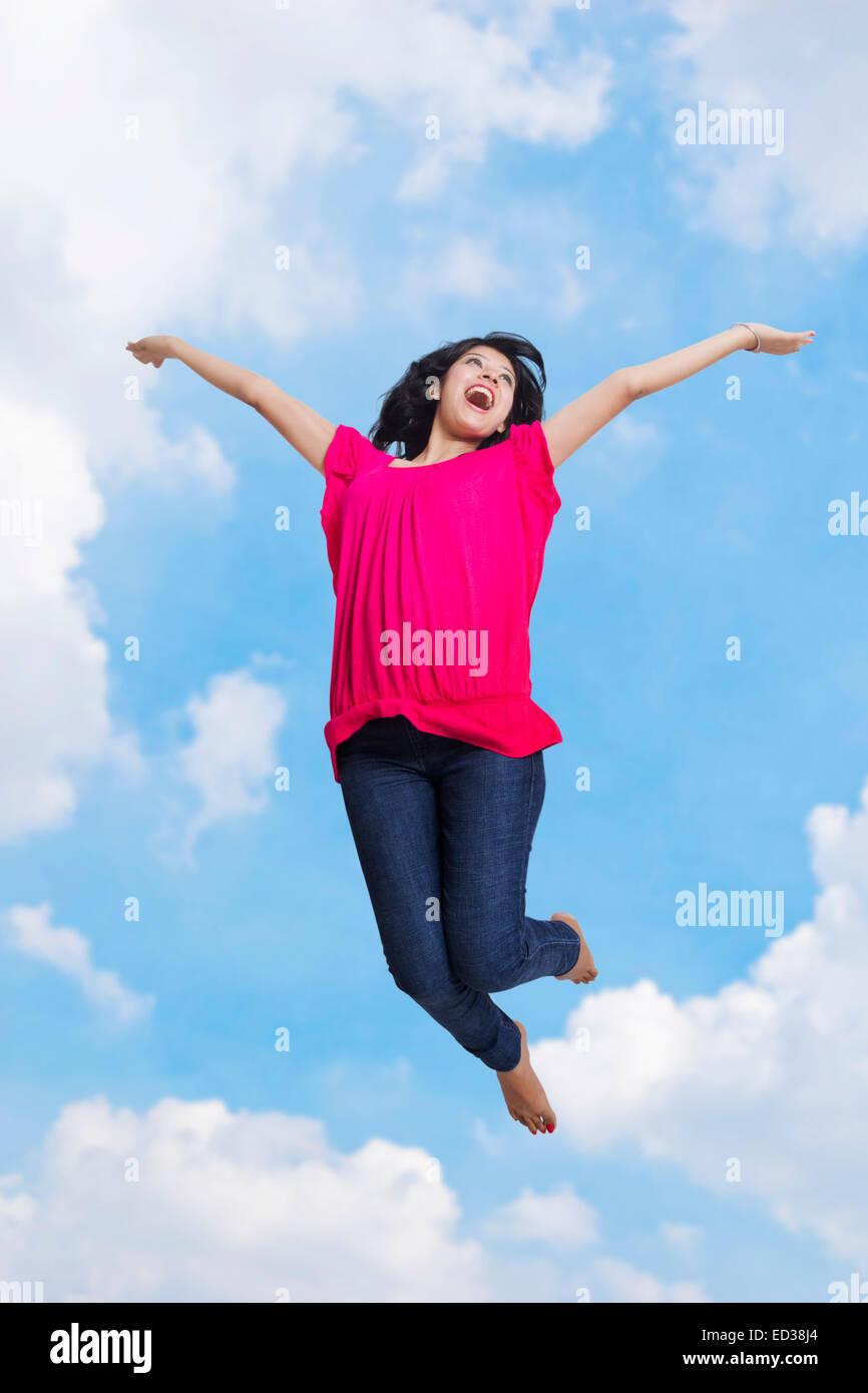 1 indian college girl Jumping fun Stock Photo - Alamy