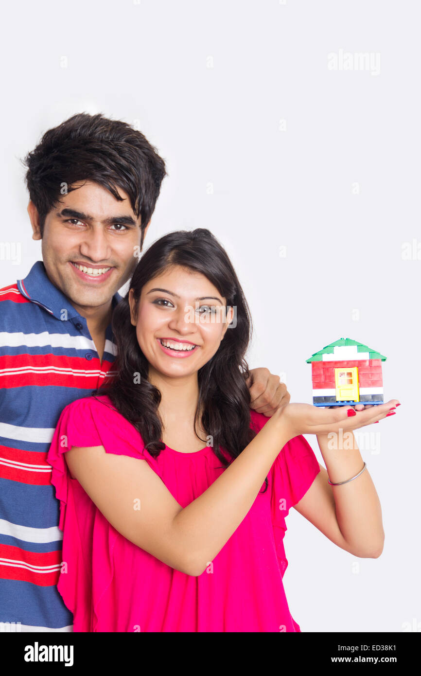 2 indian couple Dummy House showing Stock Photo - Alamy