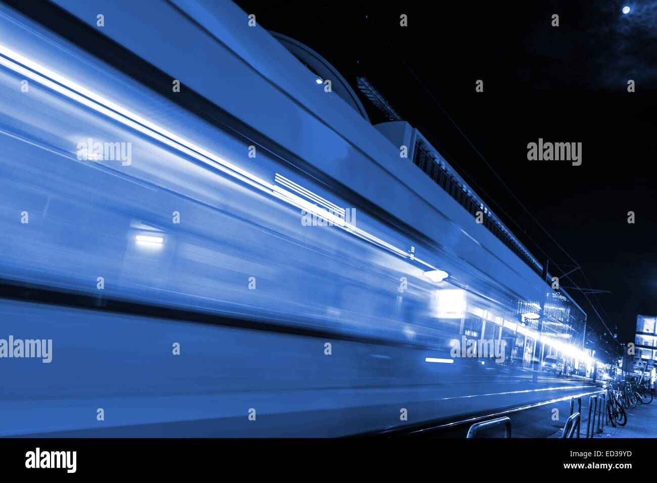 fast train in berlin by night Stock Photo - Alamy