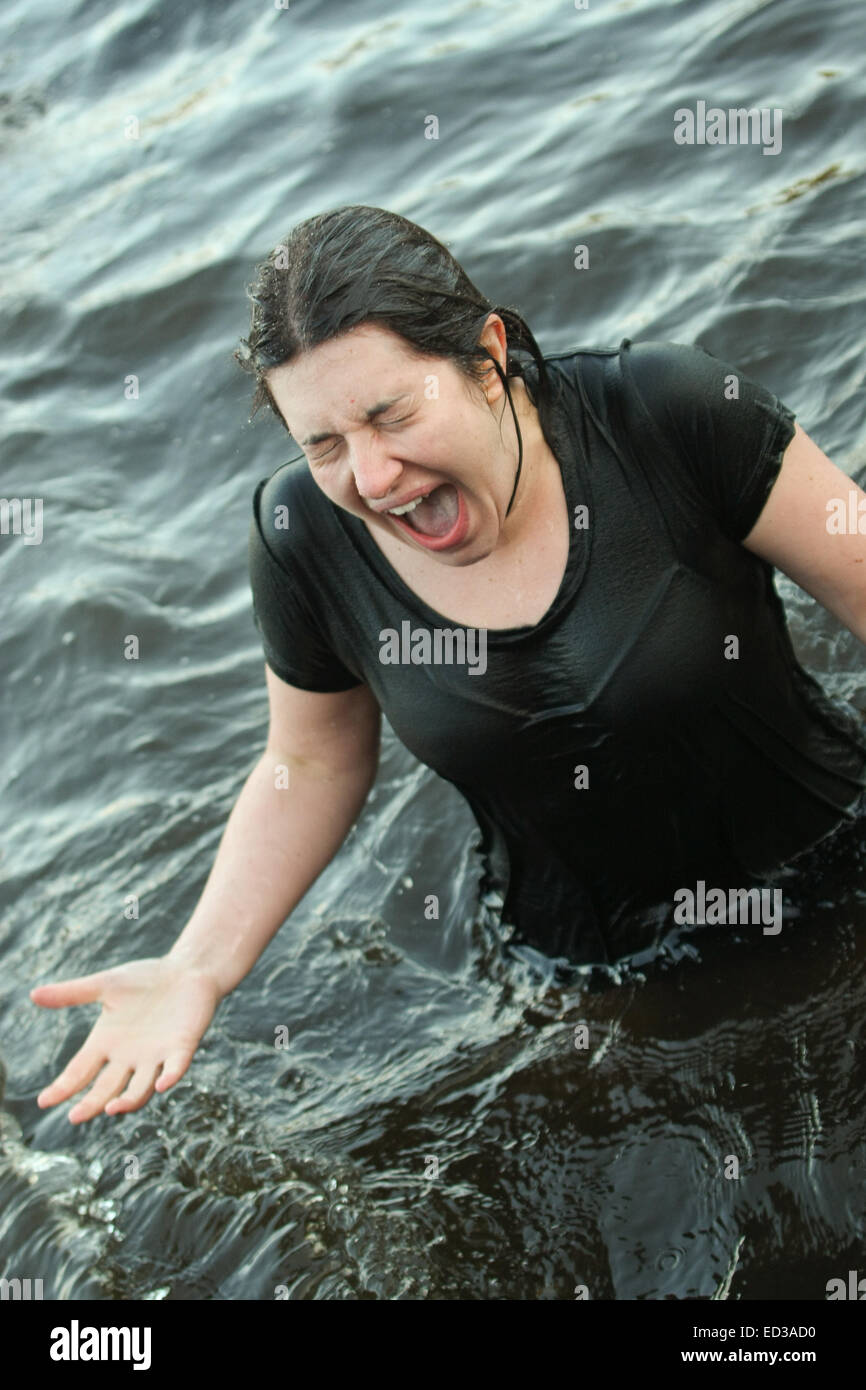Swimmers in the traditional Christmas Day cold water dip or swim in a ...