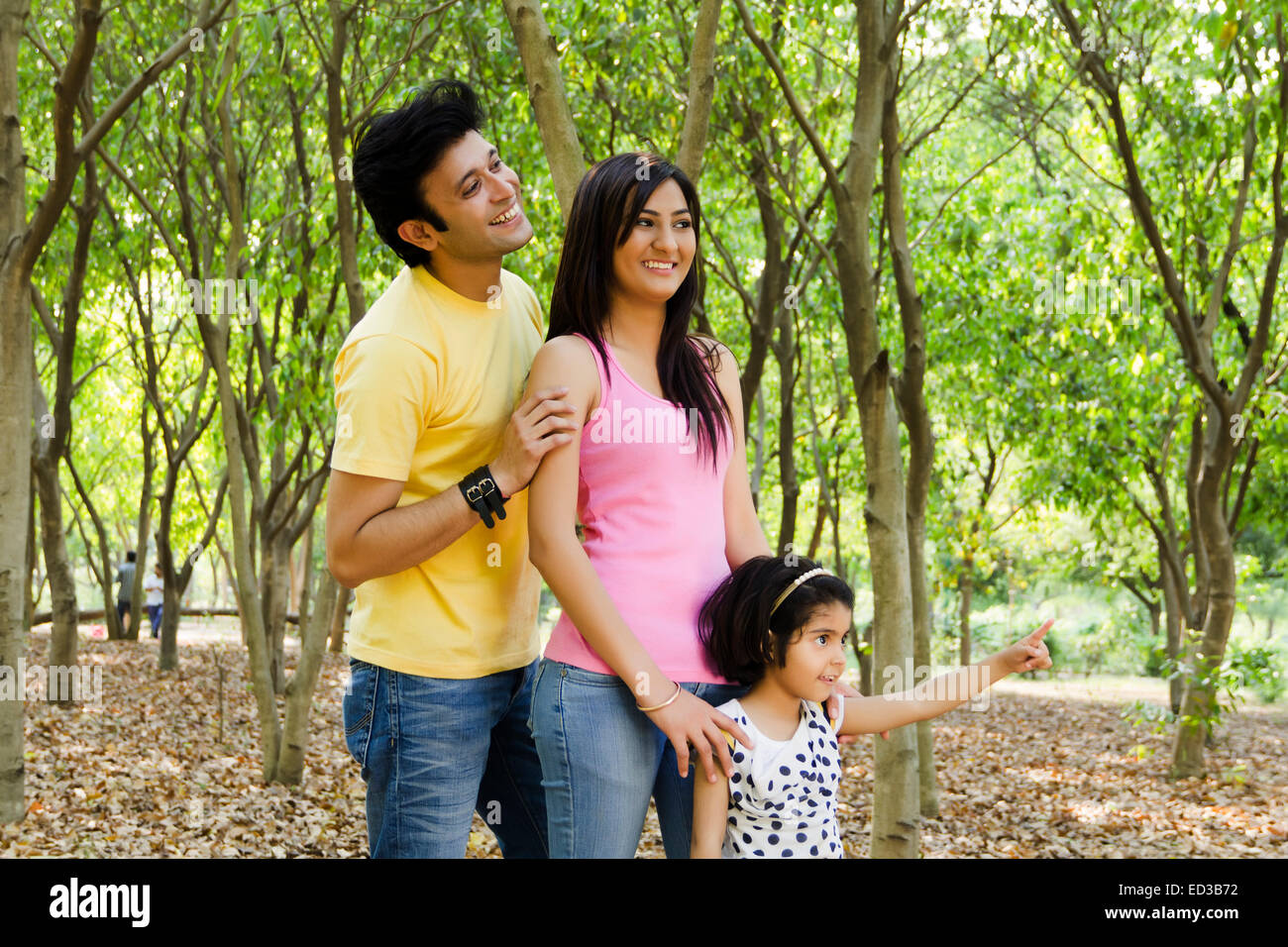 indian Parents with child park enjoy Stock Photo - Alamy