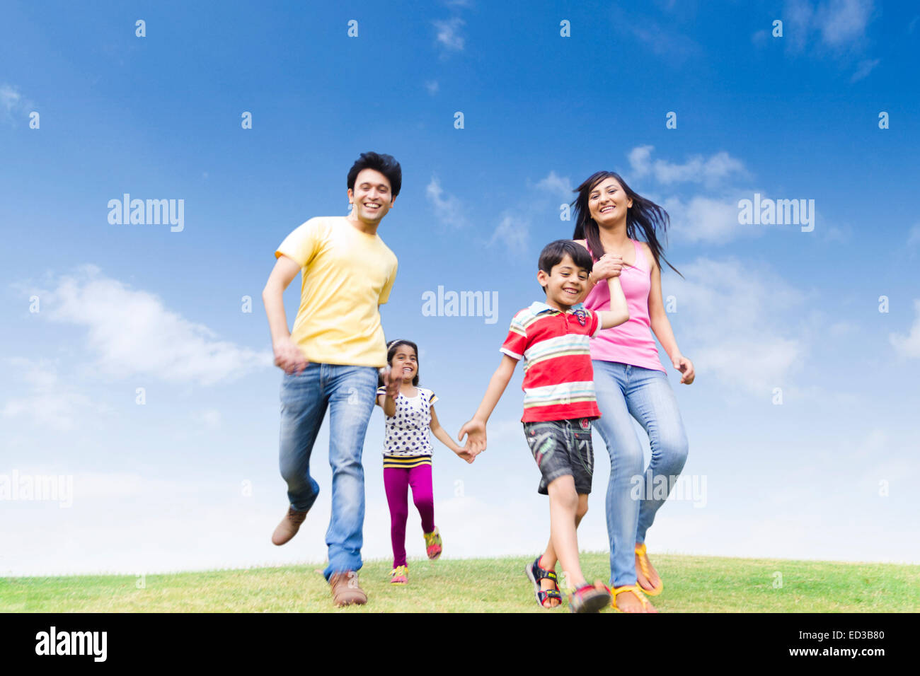indian Parents with child park Running Stock Photo - Alamy