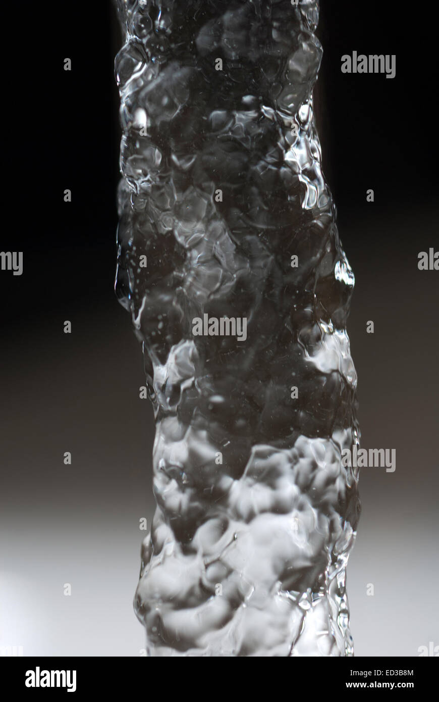 Wet water pouring flow stream column hi-res stock photography and ...