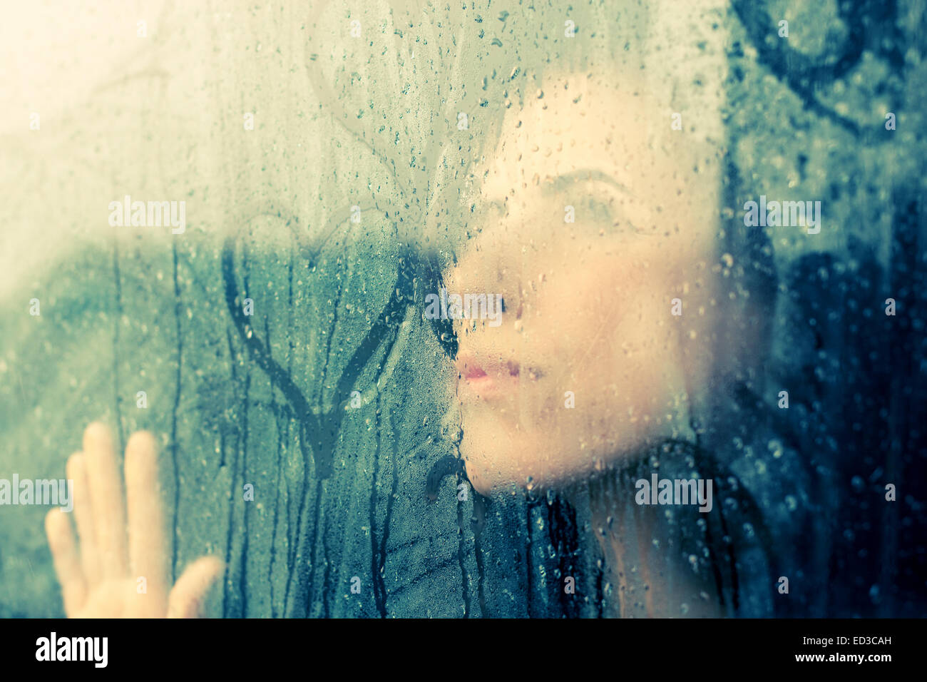 beautiful woman stands in front of the window Stock Photo - Alamy