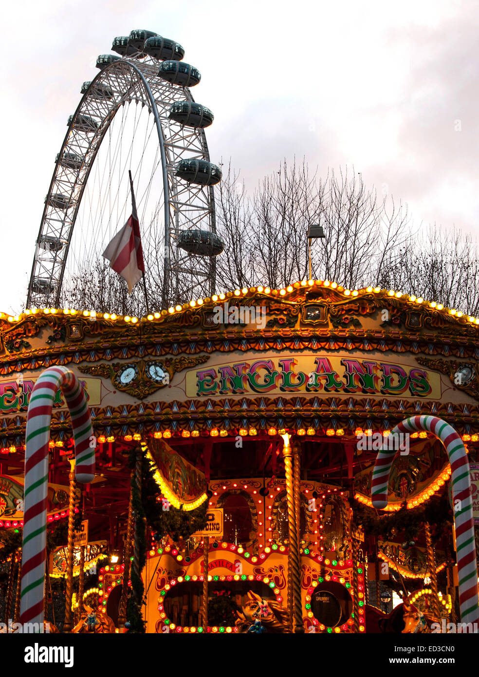 Old fashioned Carousel ride on South Bank with London Eye in background ...