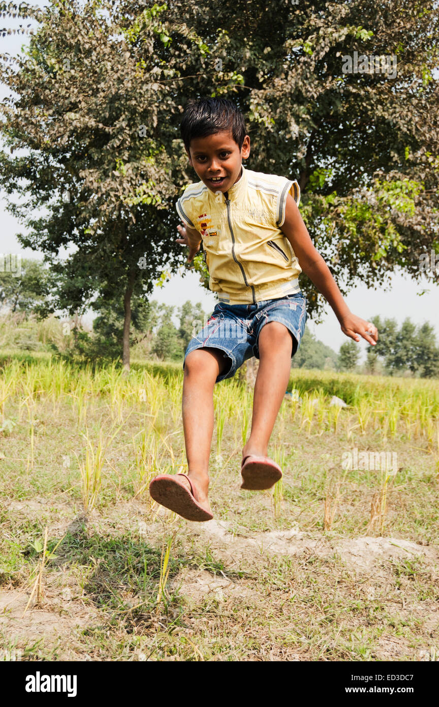 1 indian rural child boy farm Jumping Stock Photo - Alamy