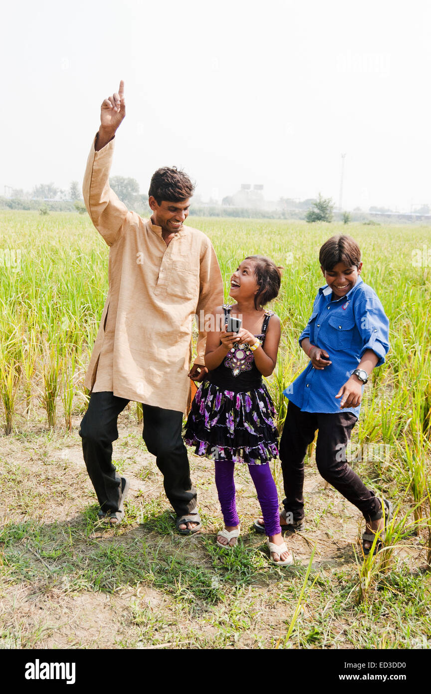 indian rural farmer and child Farm dancing phone Stock Photo - Alamy