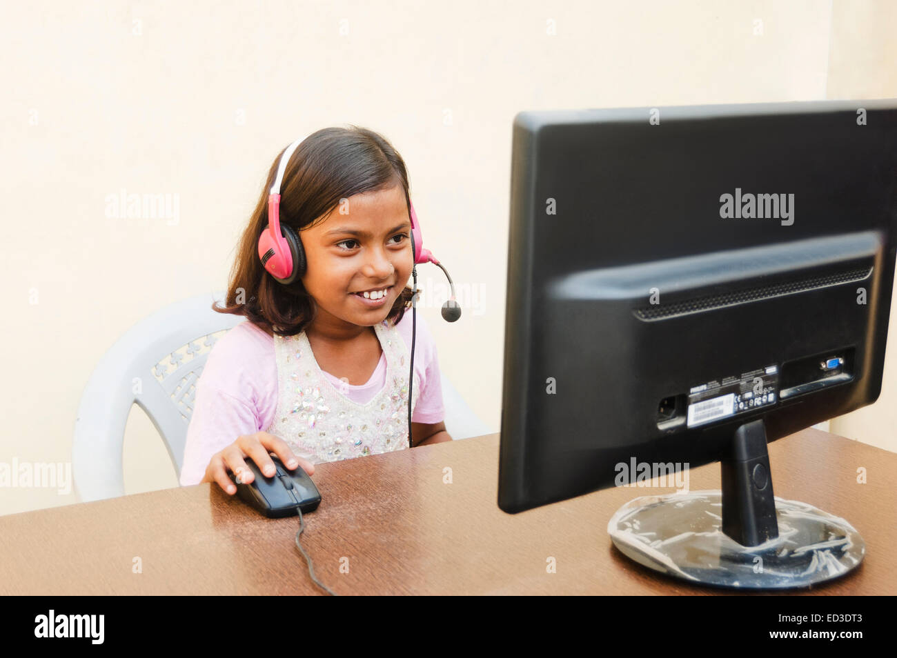 1 indian rural child girl computer working Stock Photo - Alamy