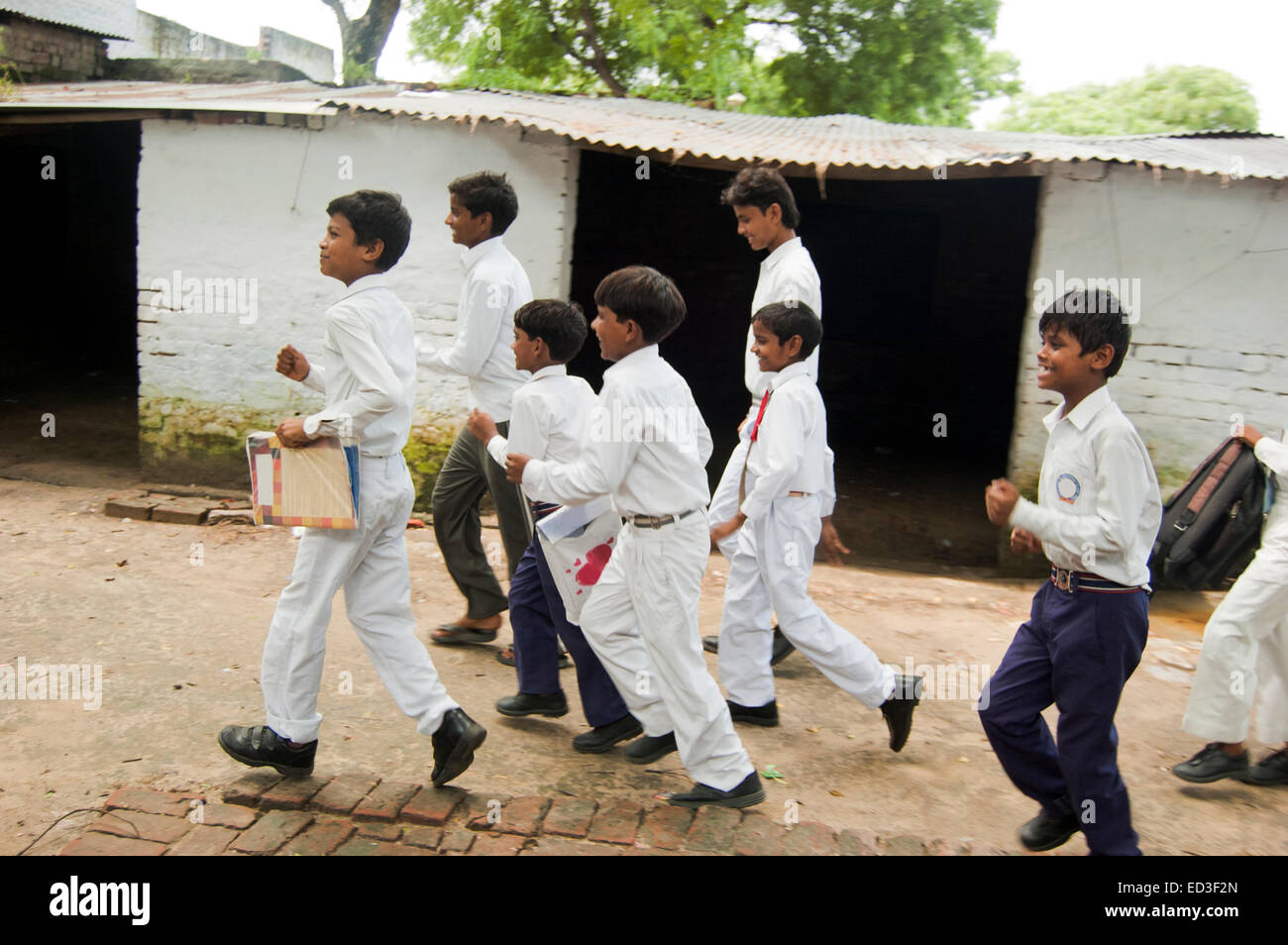 indian rural Children group Students Running Stock Photo - Alamy