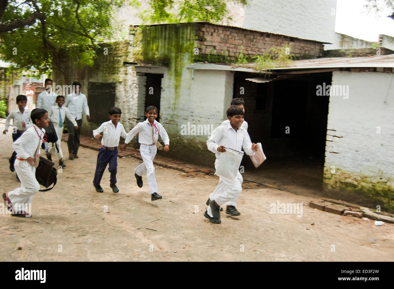 indian rural Children group Students Running Stock Photo - Alamy