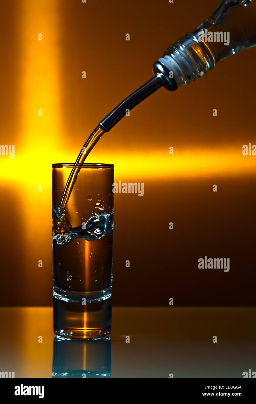 vodka in bar on a glass table Stock Photo - Alamy