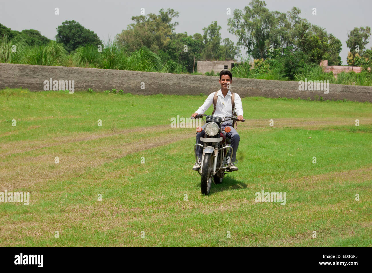 1 indian rural boy School Student Riding bike Stock Photo - Alamy