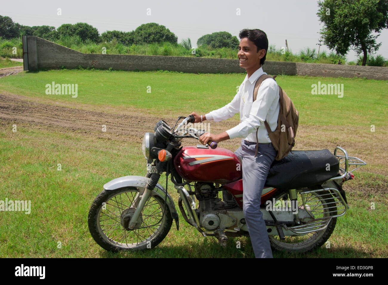 1 indian rural boy School Student Riding bike Stock Photo - Alamy