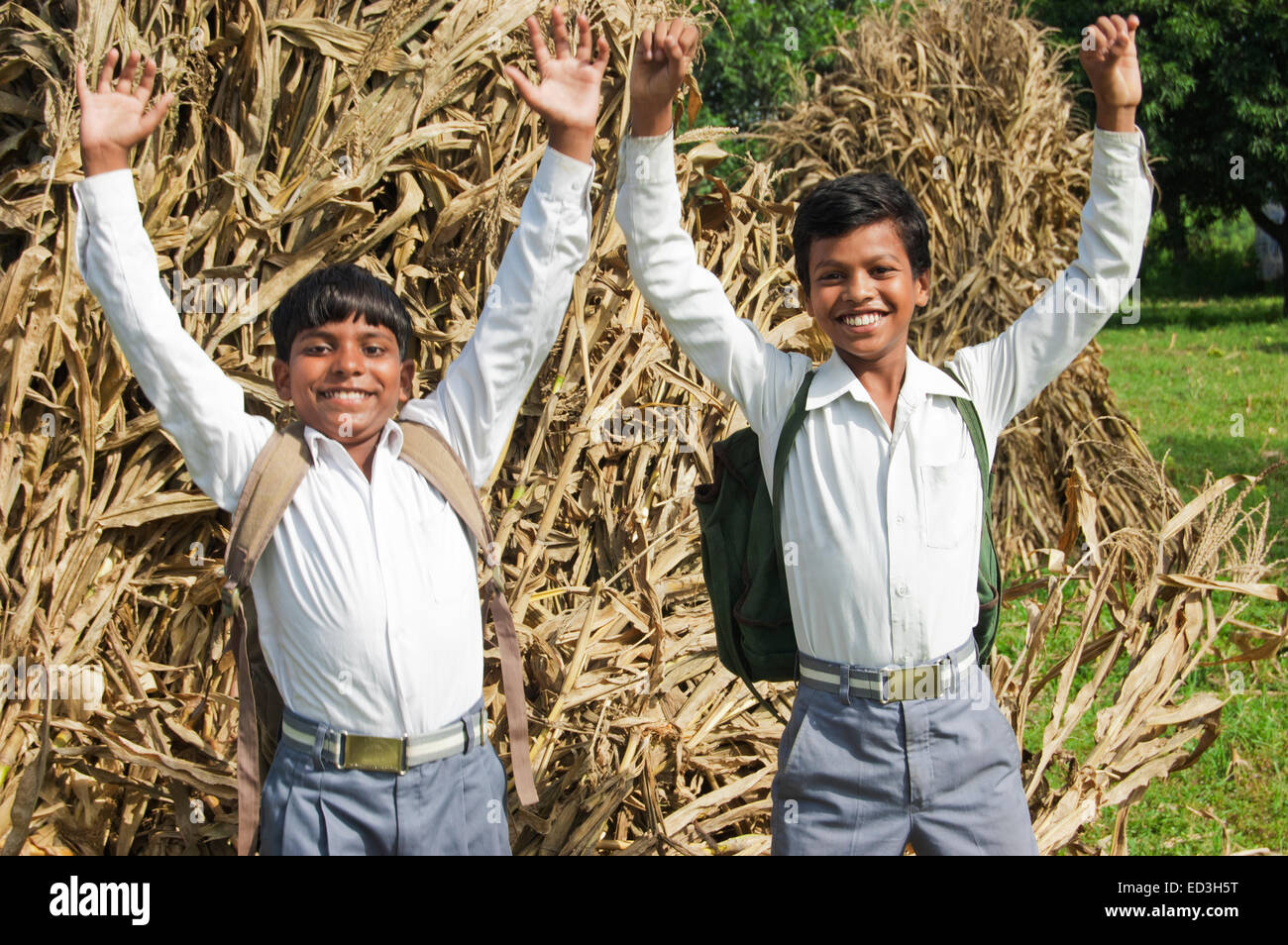 2 indian rural children school Students farm fun Stock Photo - Alamy