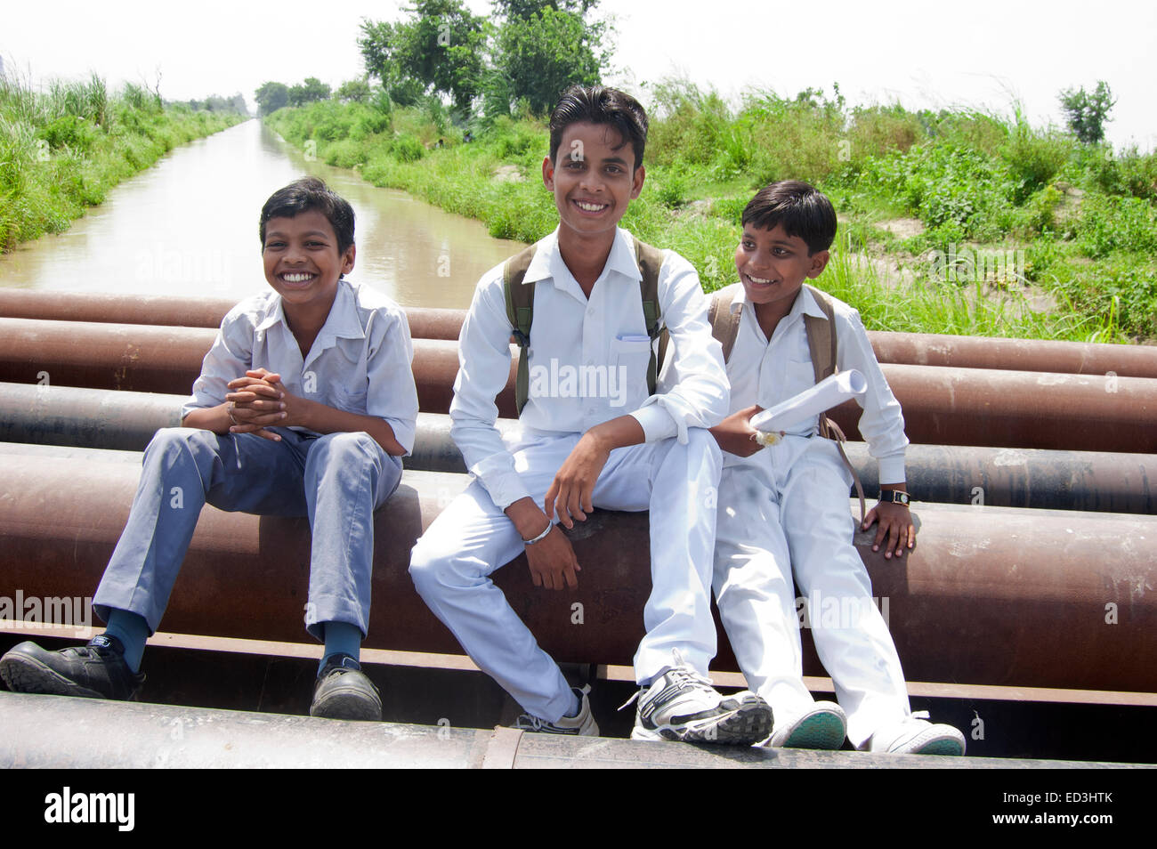 3 indian rural children School Students fun Stock Photo - Alamy