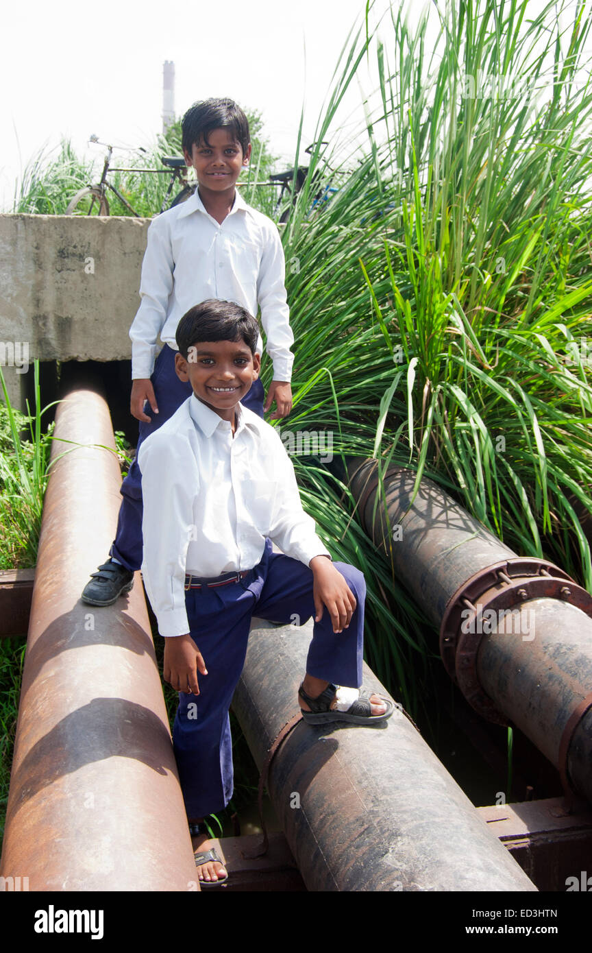 2 indian rural children School Students fun Stock Photo - Alamy