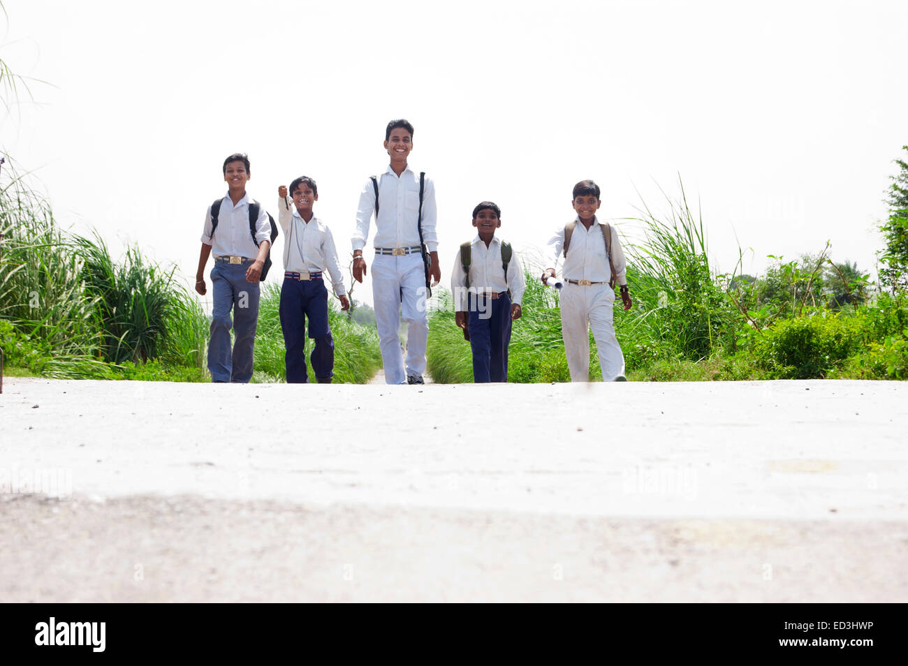 indian rural children School Students walking Stock Photo - Alamy