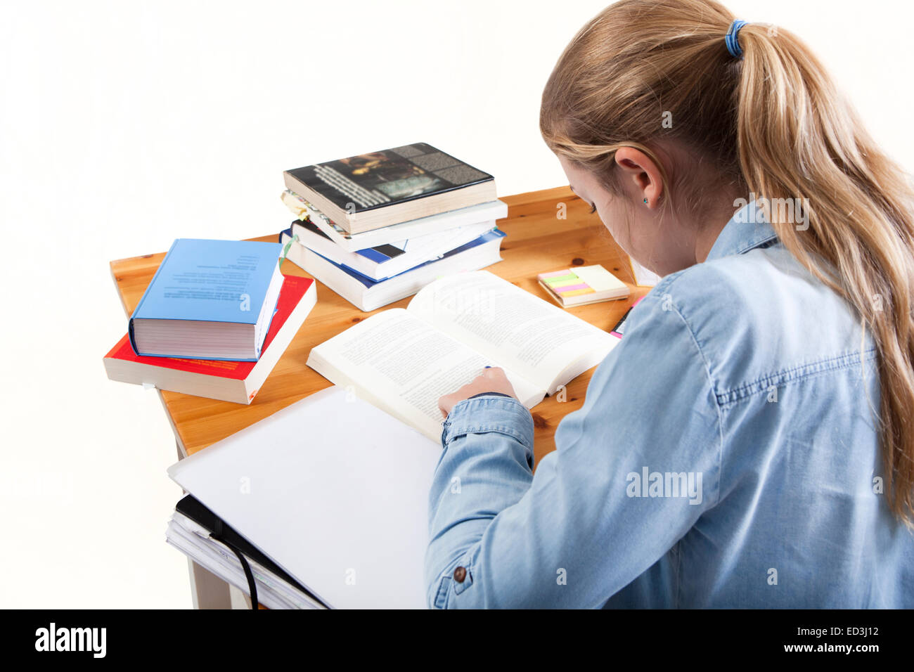Teen girl learning at the desk hi-res stock photography and images - Alamy